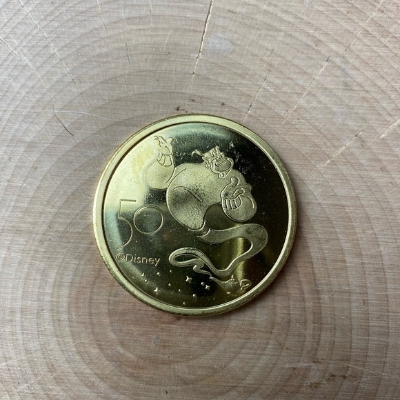 Disney | Accessories | Disney Parks 5th Anniversary Gold Coin Aladdin ...